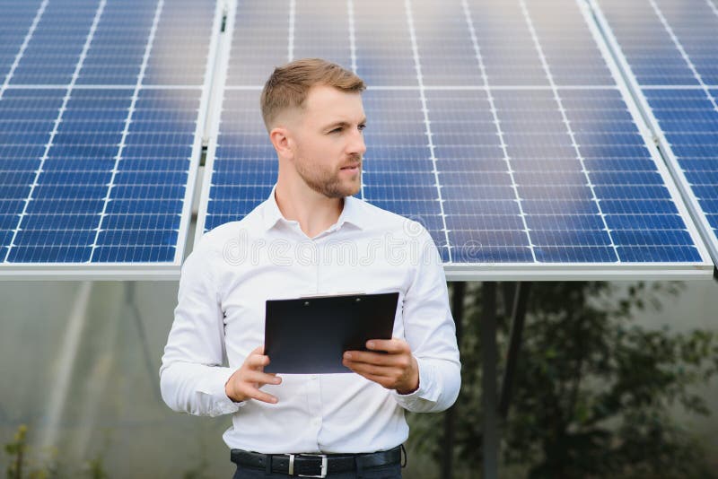 Technician Checks the Maintenance of the Solar Panels Stock Photo ...