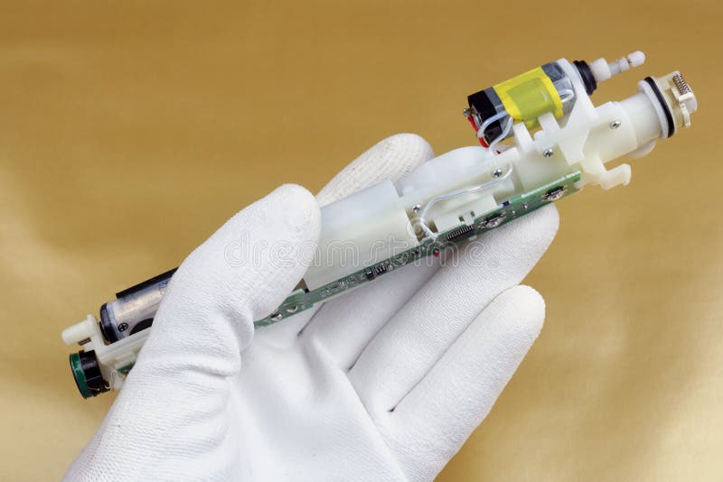 Technician Checks the Quality of the Electro-mechanical Device with ...