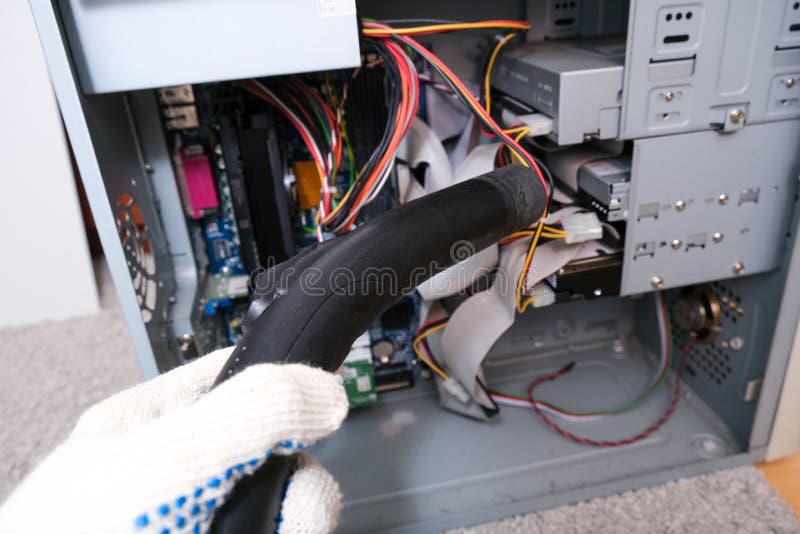A Technician Cleaning a Computer System Box, HDD with Vacuum Cleaner ...