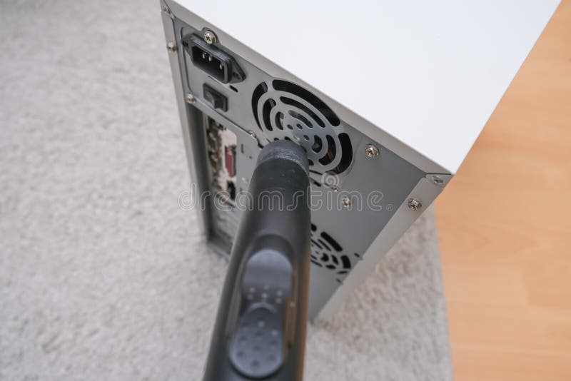 A Technician Cleaning Fan of a Computer System Box with Vacuum Cleaner ...