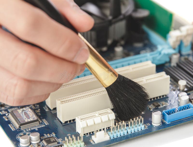 Technician Cleaning Up the Hardware of Computer Using Brush Stock Image ...