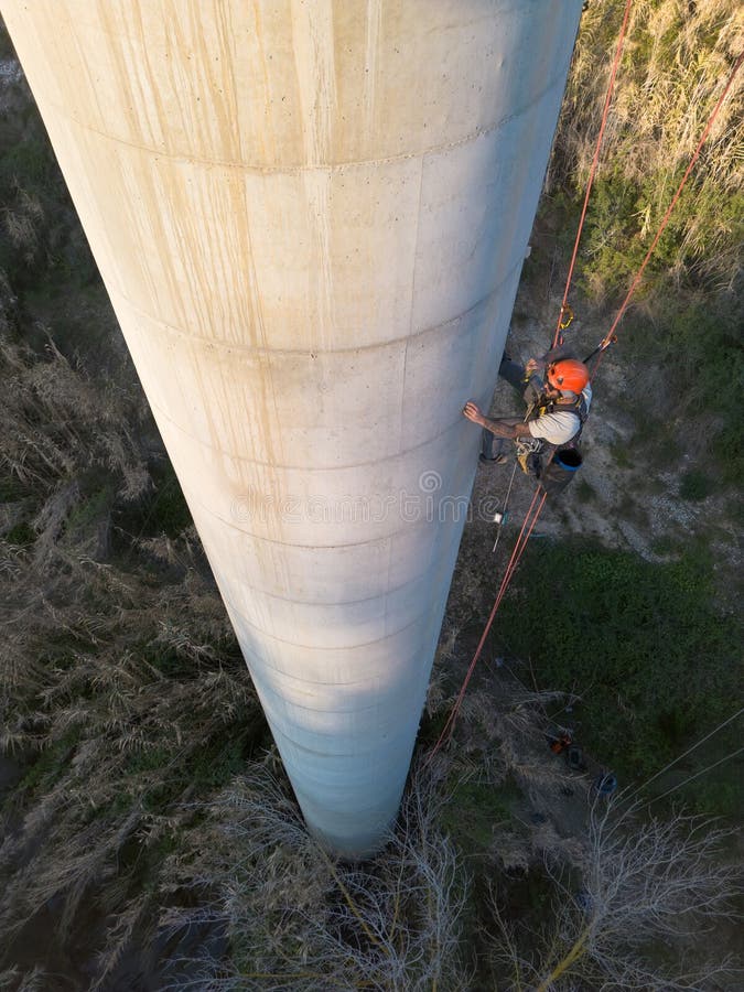 Technician Climbing Concrete Chimney Using Double Rope Technique Stock ...