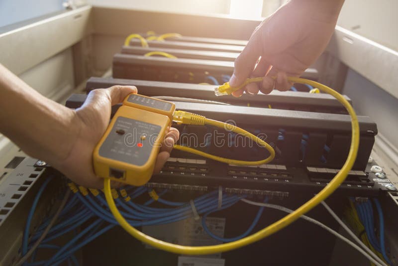 Technician Connecting Network Cable To Switch Information Technology ...