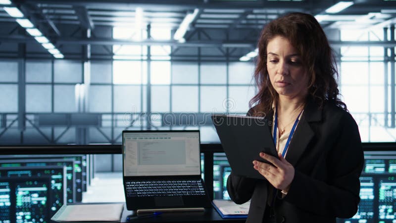 Technician in Data Center with Tablet Integrating AI Driven Automation Tools Stock Video - Video ...