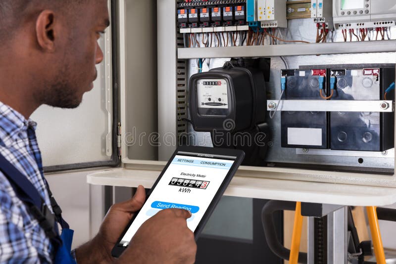 Technician Doing Meter Reading Stock Photo - Image of looking, african ...