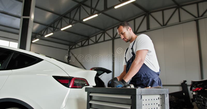 Technician Engages in Troubleshooting EV Car Battery Cell Module Stock ...