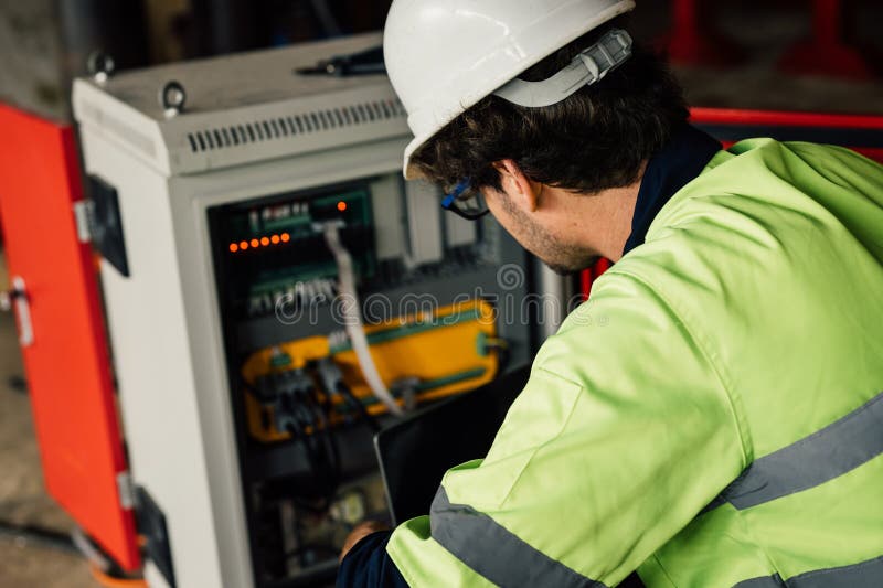 Technician Engineer Checking and Repairing Automatic Robotic Machine ...