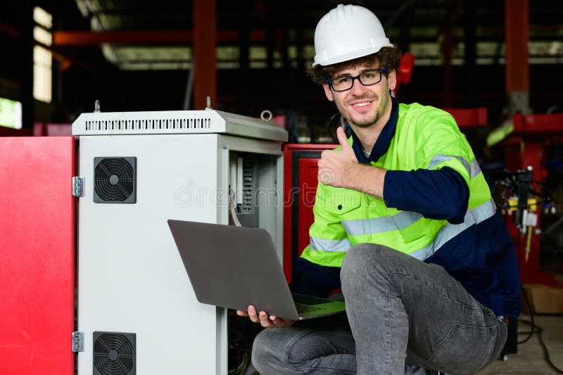 Technician Engineer Holding Robot Controller Checking and Repairing Machine Stock Photo - Image ...