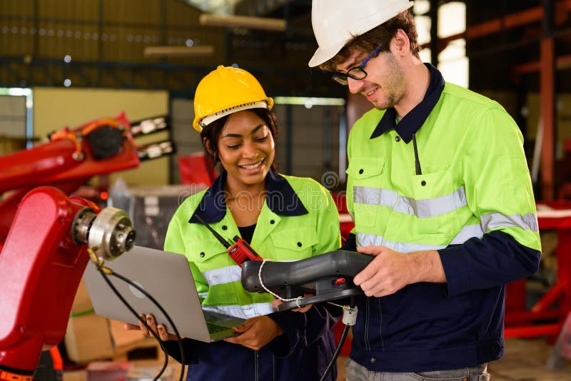 Technician Engineer Holding Robot Controller Checking and Repairing ...