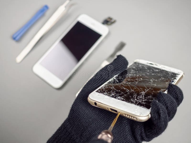 Technician Repairing Broken Smartphone on Desk Stock Image - Image of ...