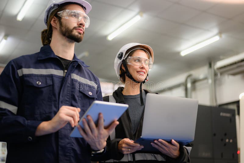 Technician Engineer Team Checking and Repairing Part of Automatic ...