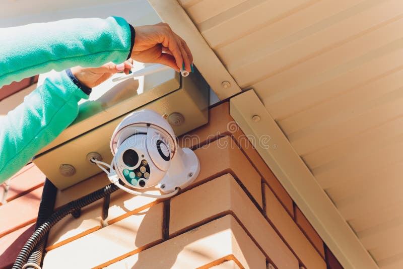 Technician Female Setup Cctv Camera on Wall. Stock Photo - Image of ...