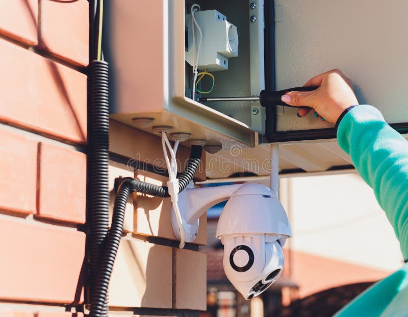 Technician Female Setup Cctv Camera on Wall. Stock Image - Image of ...