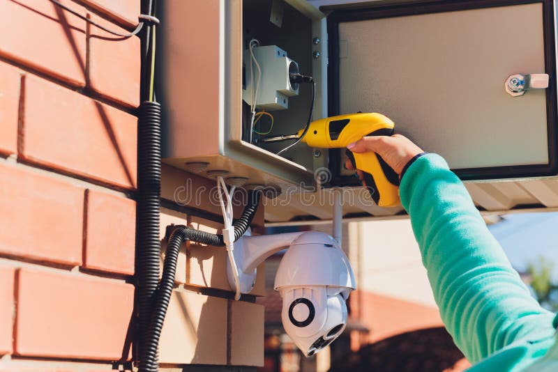 Technician Female Setup Cctv Camera on Wall. Stock Photo - Image of ...