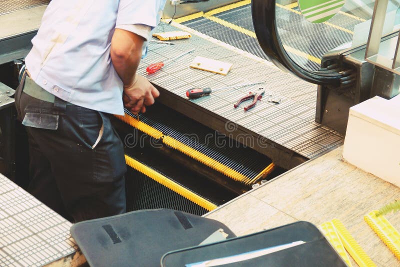 Technician Fix the Escalator at Shopping Mall Stock Photo - Image of ...