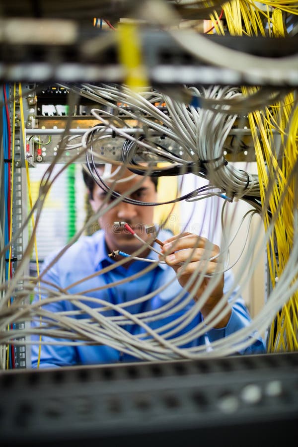 Technician fixing cable stock photo. Image of computer - 78692792