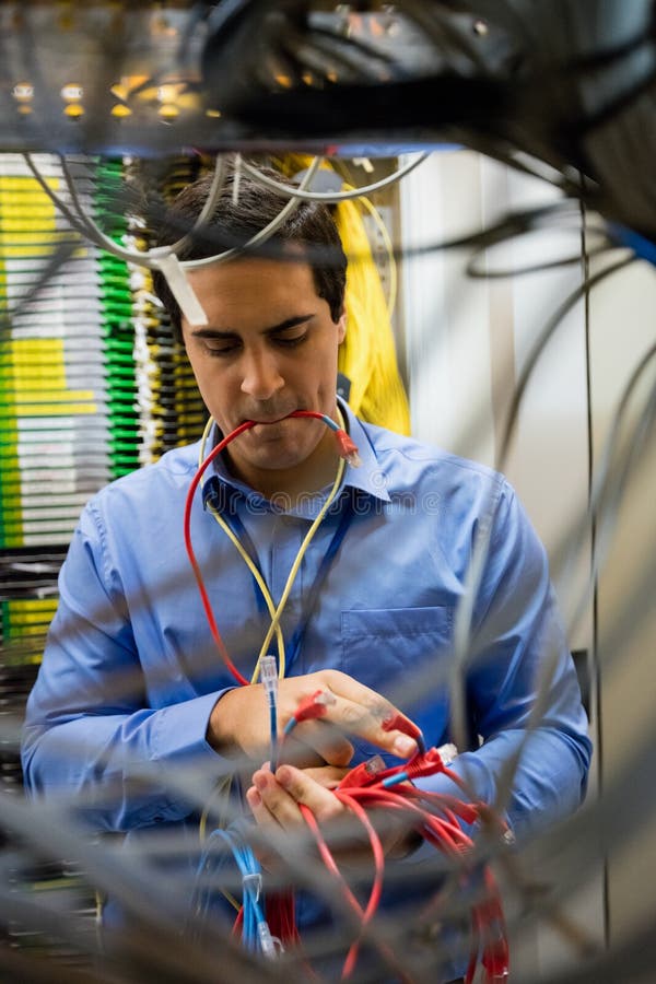 Technician fixing cable stock photo. Image of complex - 78693764