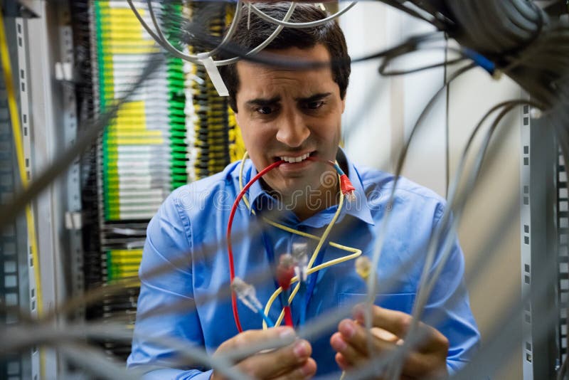 Technician fixing cable stock photo. Image of computer - 78692792