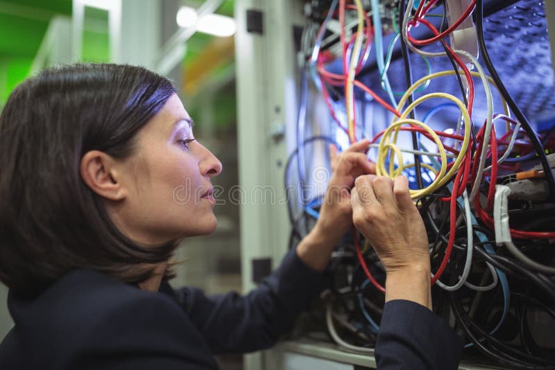 Technician fixing cable stock image. Image of electronic - 78714969