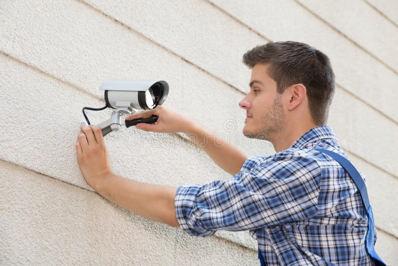 Technician Fixing Cctv Camera on Wall Stock Photo - Image of ...