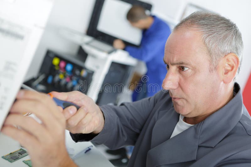 Technician Fixing Printer by Screwdriver Stock Image - Image of printer ...
