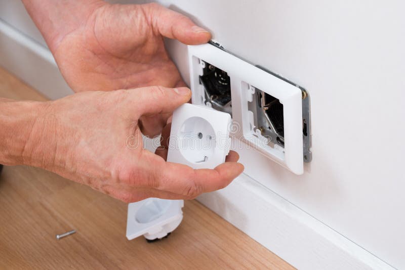 Technician fixing socket stock image. Image of assembly - 54961411