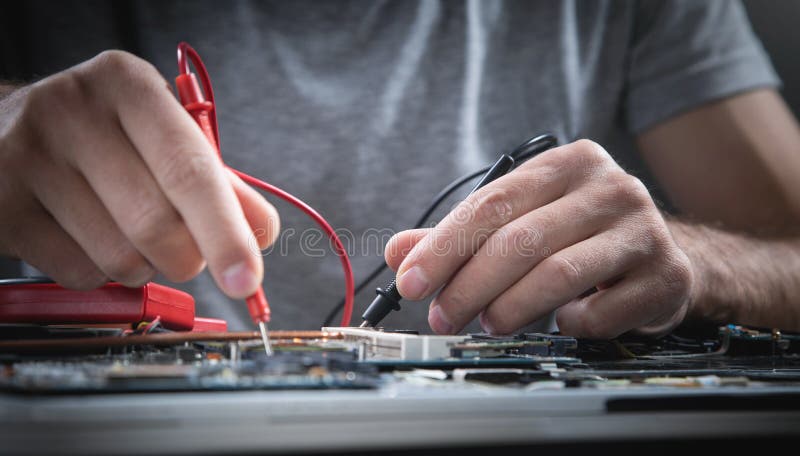 Technician Hands Checking Motherboard with Multimeter Stock Image ...