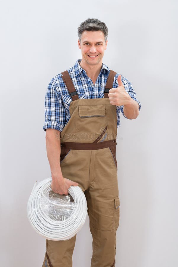 Technician holding cable stock image. Image of manual - 54962995