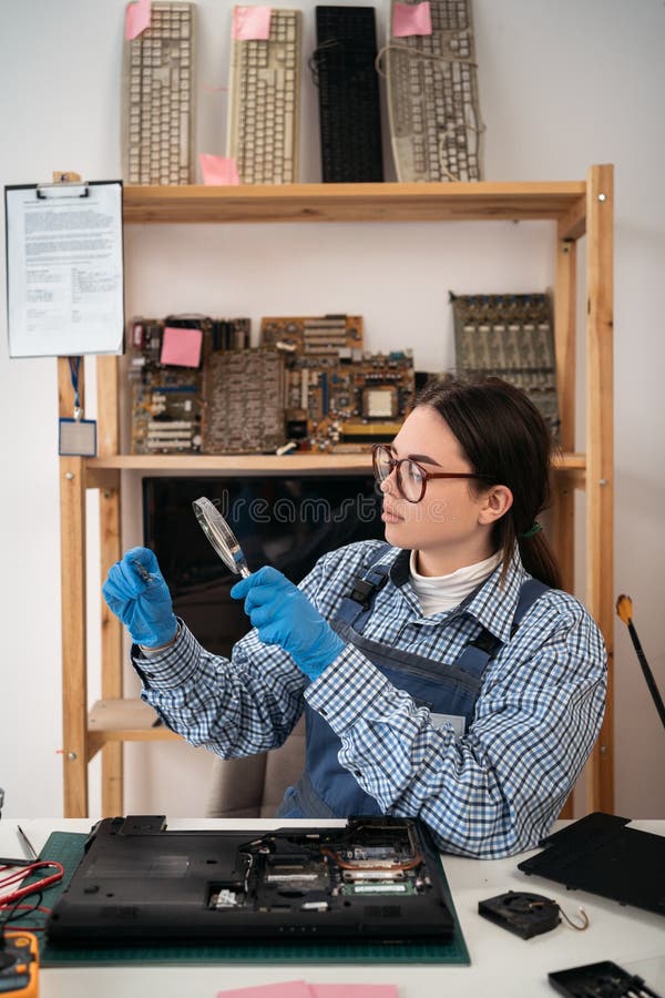 The Technician Holding a CPU of the Laptop Computer Motherboard and ...
