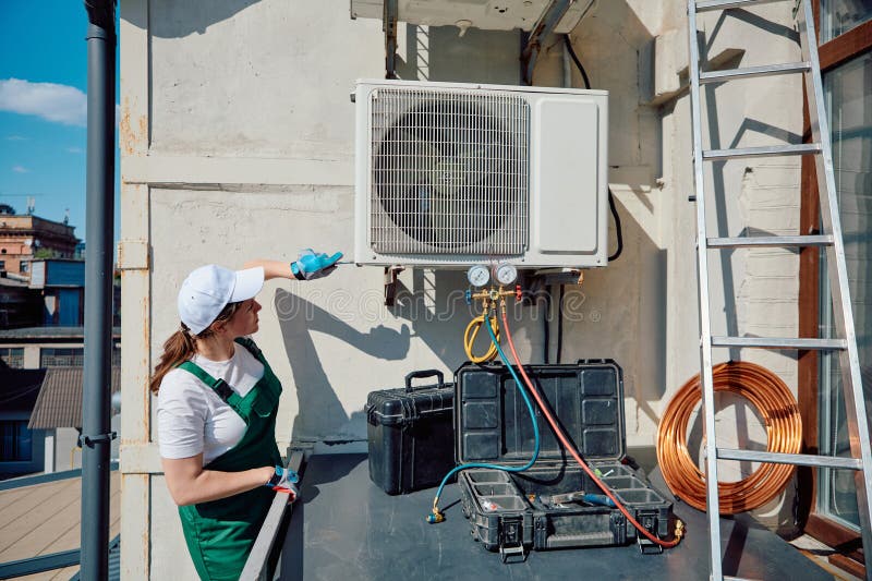 Hvac Technician Inspecting Air Conditioning Unit Outdoors Stock Photos - Free & Royalty-Free ...