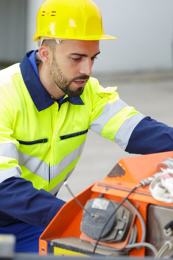 Technician Inspecting Defect on Machine Stock Image - Image of olive ...