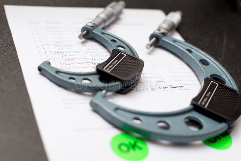 Technician Inspector Using Quality Control Tools in Industry ...