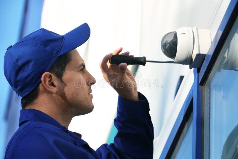 Technician Installing CCTV Camera on Wall Stock Image - Image of ...