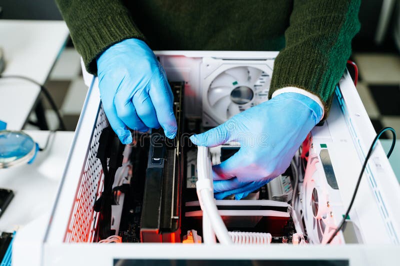 Technician Installing GPU in Custom PC Build Wearing Gloves. Concept of ...