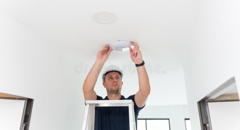 Technician is Installing an LED Spotlight in the Ceiling. Stock Image - Image of lamp, home ...