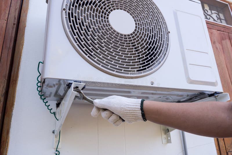 Installing Air Conditioning Unit Stock Image - Image of contractor ...