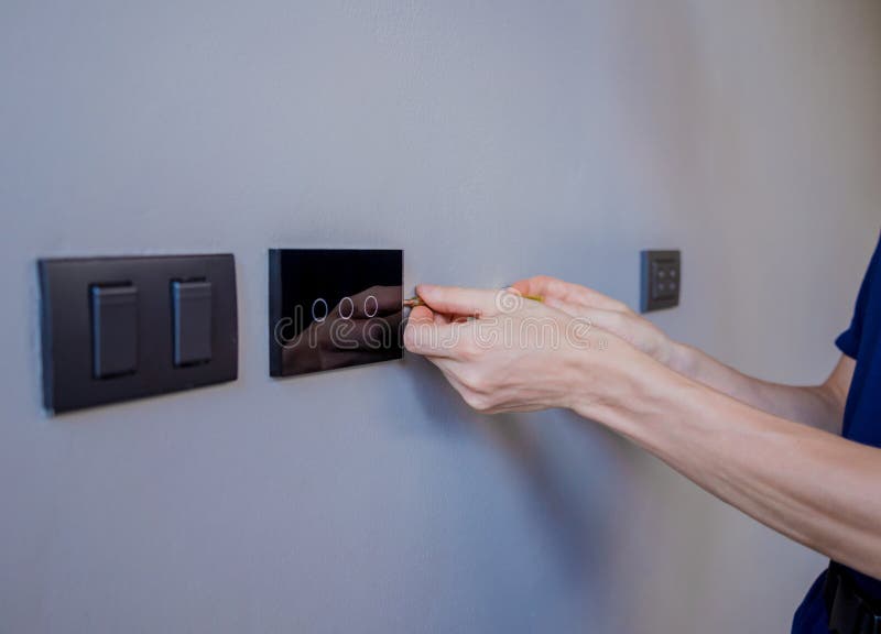 Technician Installing Sensor Light Switch at Modern Villa Stock Image ...