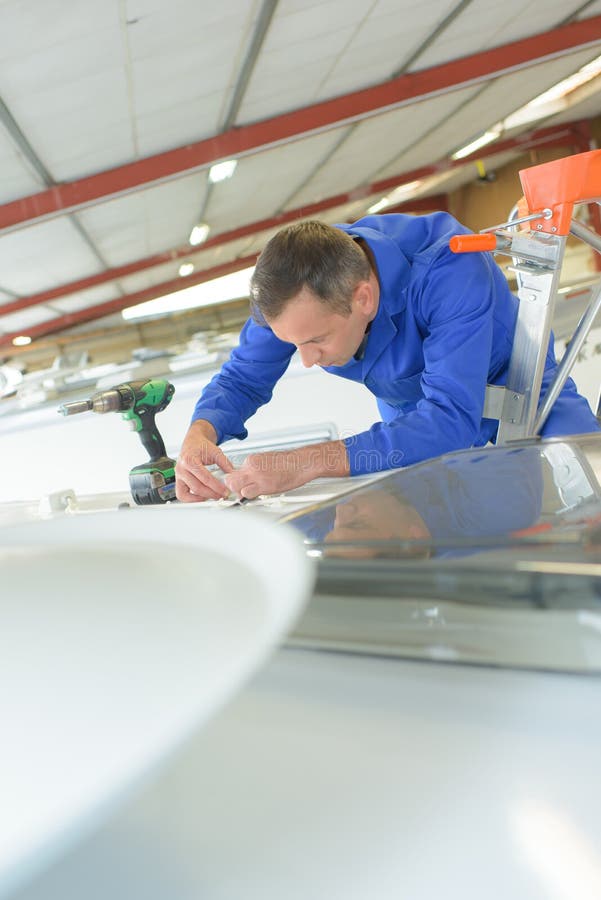 Technician Installing on Site Stock Photo - Image of safety, profession ...