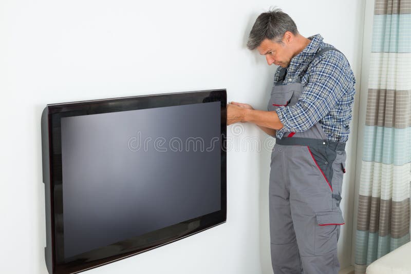 Technician Installing Television at Home Stock Image - Image of fixing ...