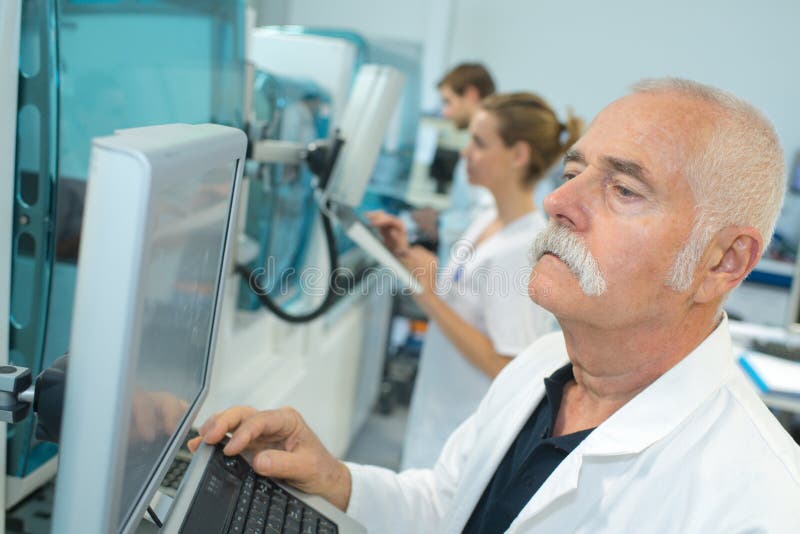 Technician Laboratory Equipment Stock Image - Image of group, chemicals ...