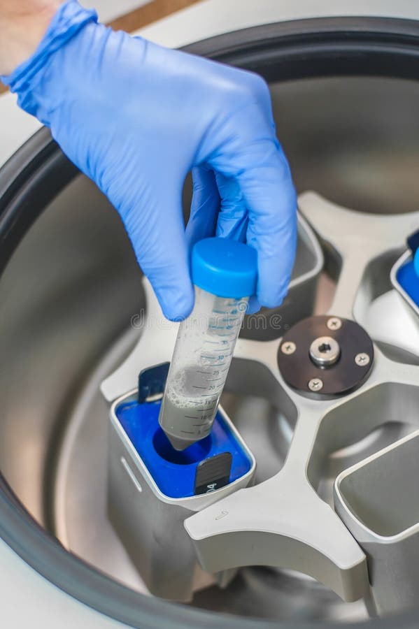 Technician Loading a Sample To Centrifuge Machine Stock Image - Image ...