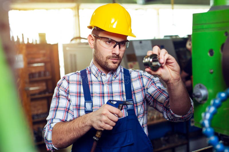 Technician Looking at Detail at Manufacturing Stock Photo - Image of ...