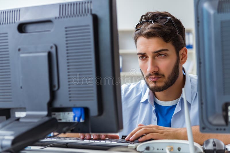 The it Technician Looking at it Equipment Stock Photo - Image of desk ...