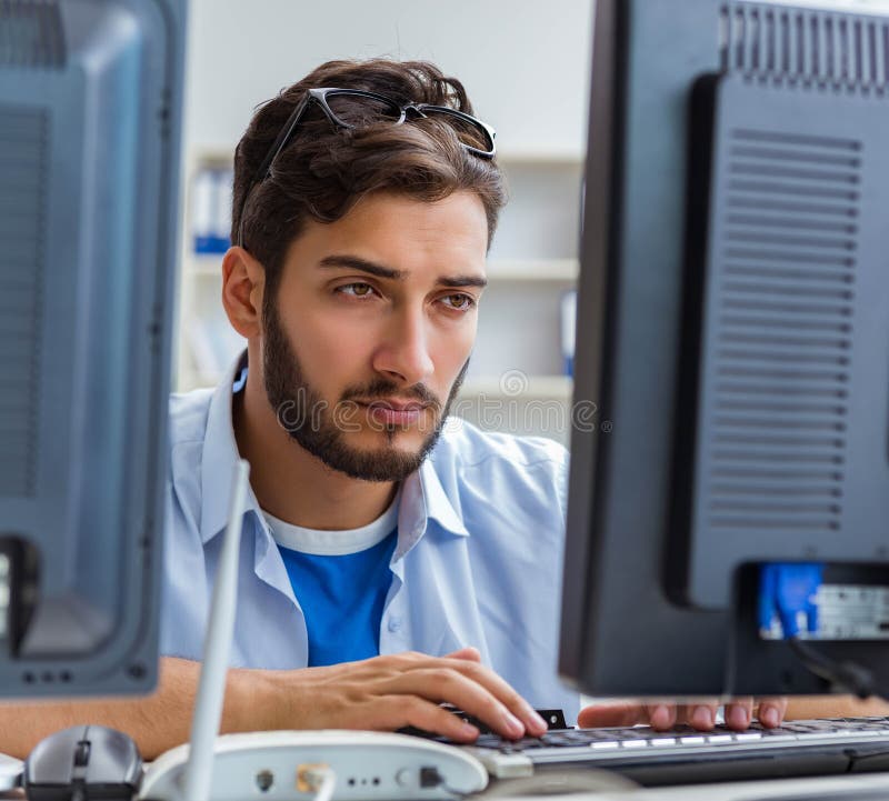 It Technician Looking at it Equipment Stock Photo - Image of displays ...