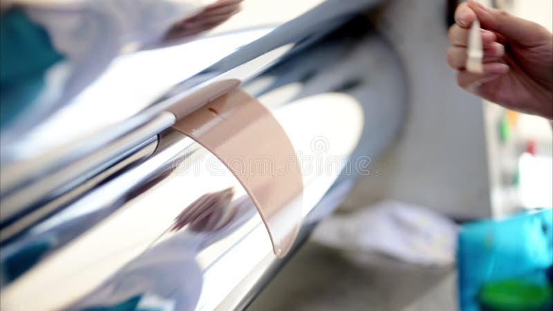 Technician Making Prosthetic Device Using Grinder To Smooth Socket ...