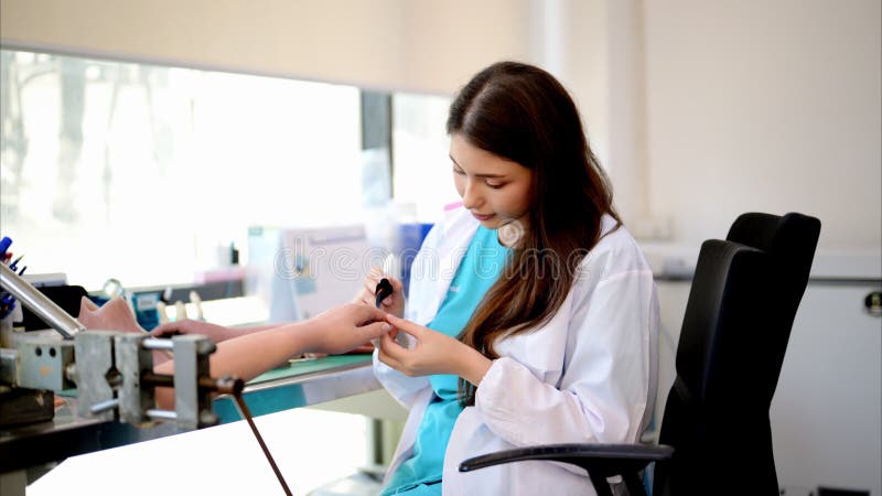 Technician Making Prosthetic Device Using Grinder To Smooth Socket ...