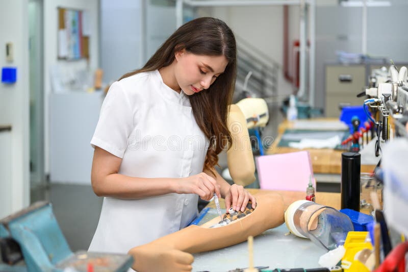 Technician Making Prototype of Prosthetic Leg, Artificial Metal Limb ...