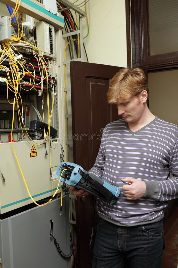 Technician Measuring Fiber Optic Stock Photo - Image of cable, person ...