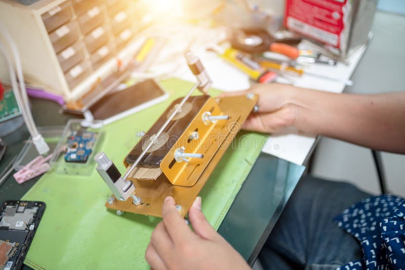 Technician Mobile Change Mobile Display in the Mobile Shop Stock Photo ...