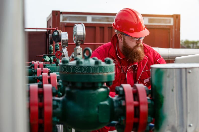 Technician in Oil and Gas Refinery. Worker in Oil Refinery Stock Image ... Technician in Oil and Gas Refinery. Worker in Oil Refinery Stock Image ...